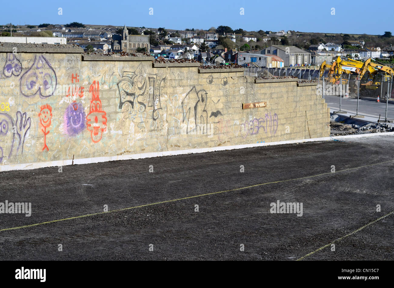 Wall with graffiti on construction site Hayle Cornwall UK Stock Photo ...