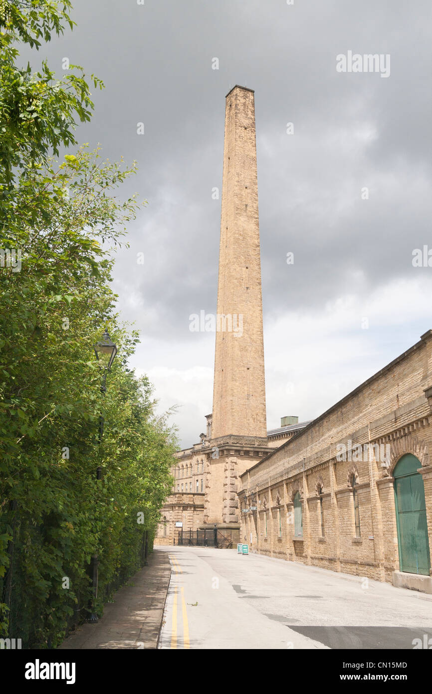 A mill factory chimney at Saltaire near Bradford. Stormy clouds Stock ...