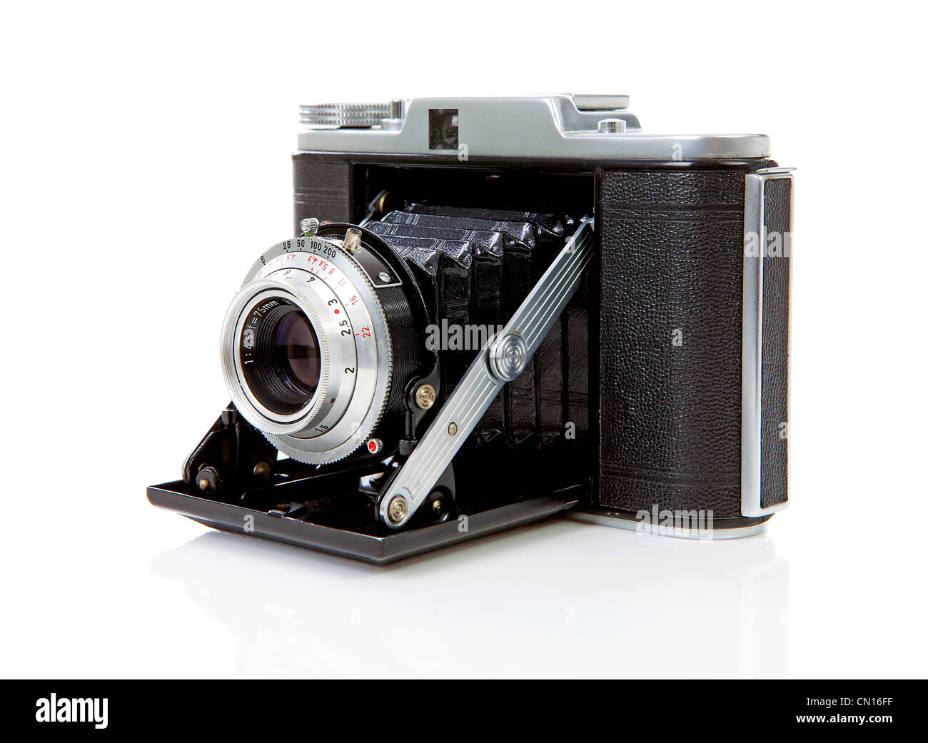 Old fashioned photo camera on white background Stock Photo - Alamy