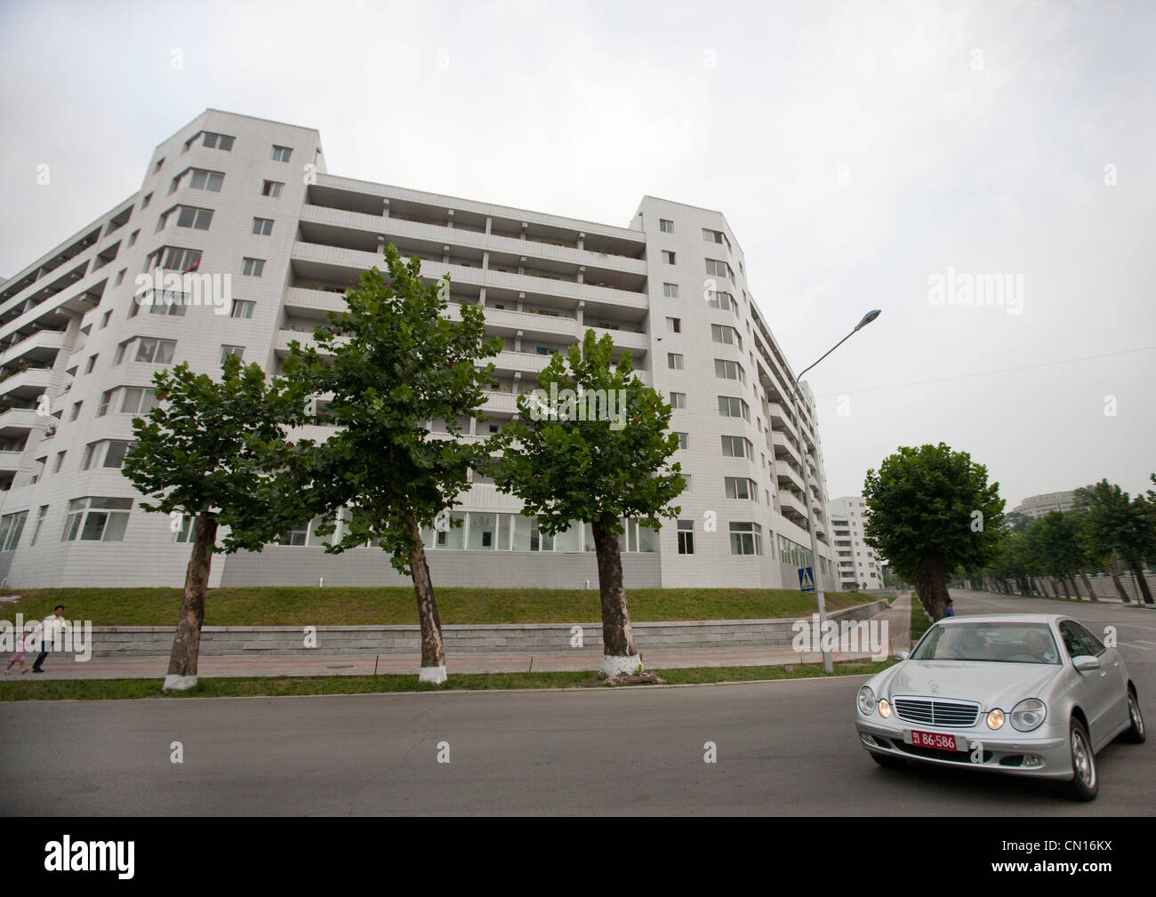 Mercedes in front lixury apartments in Pyongyang North Korea Stock ...