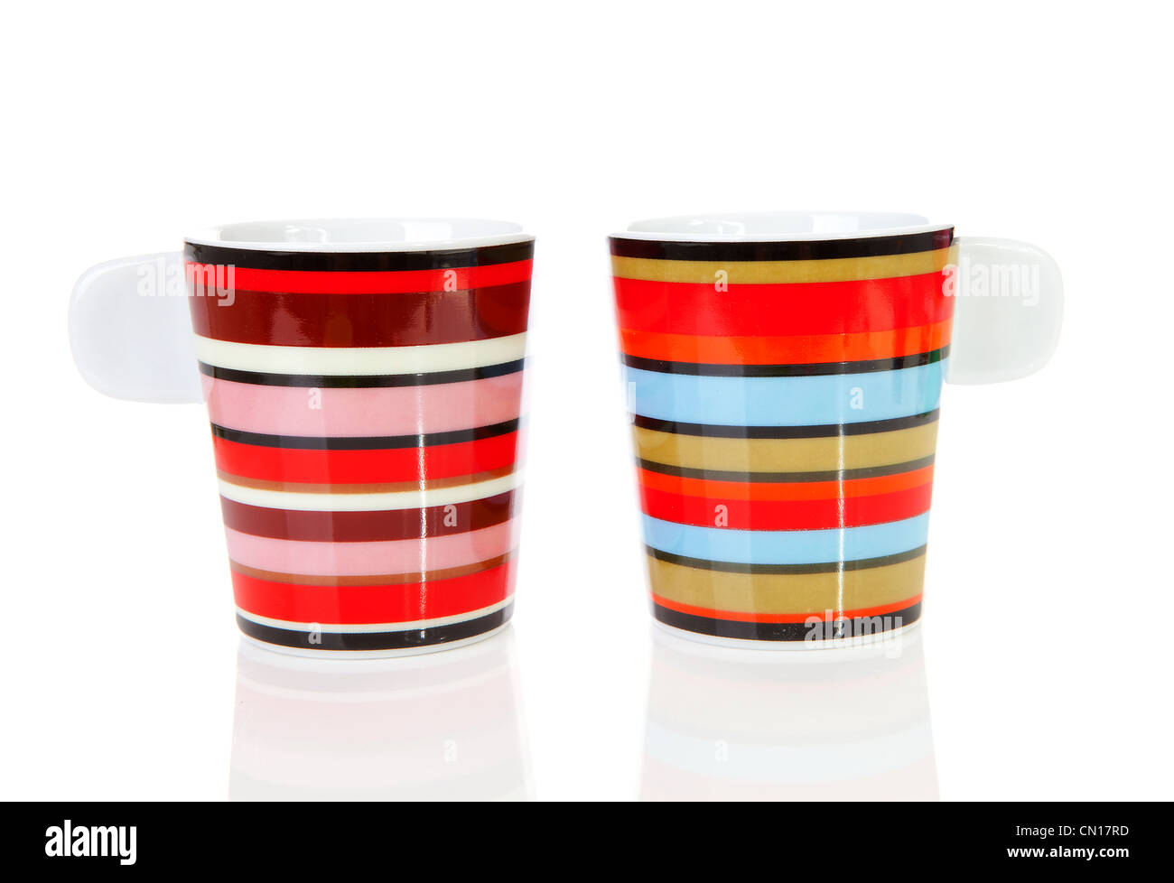 Two colorful empty coffee cups over white background Stock Photo - Alamy
