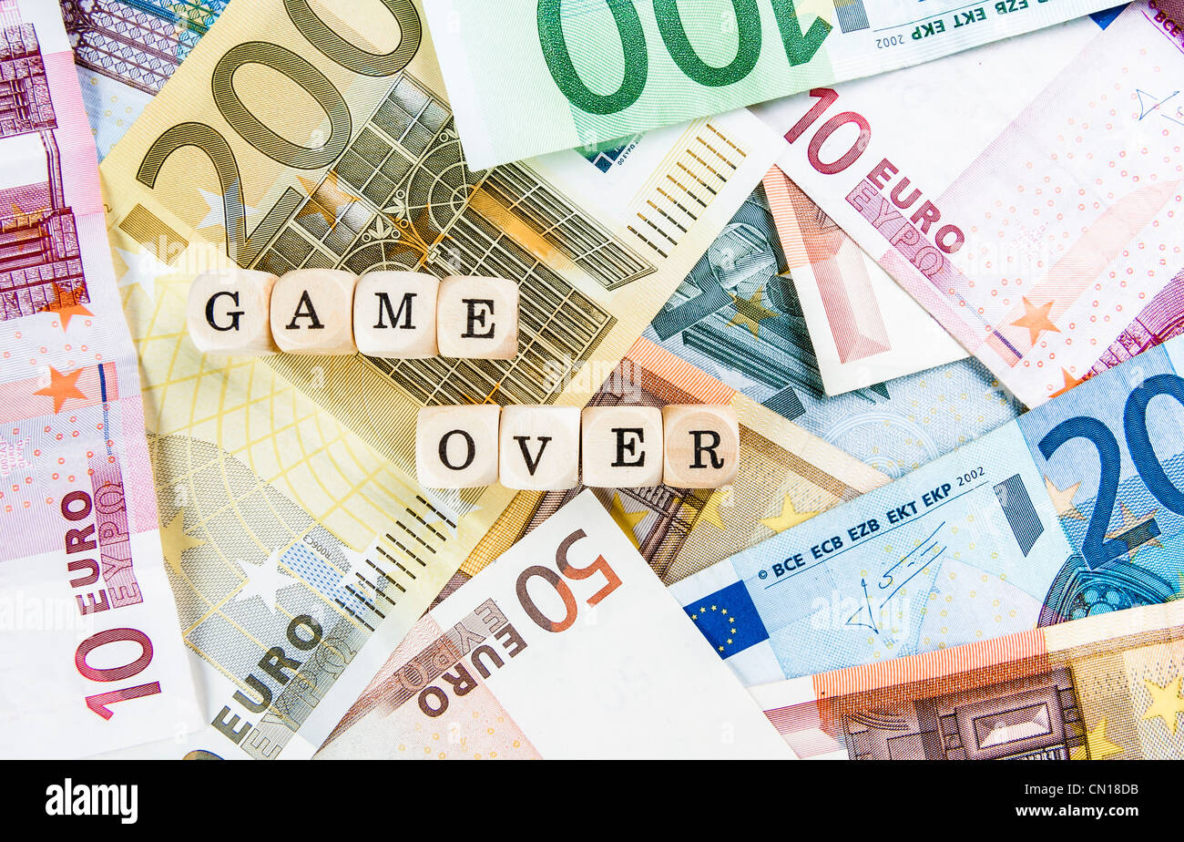 Game over written with cubes / letters and different euro bills as a ...