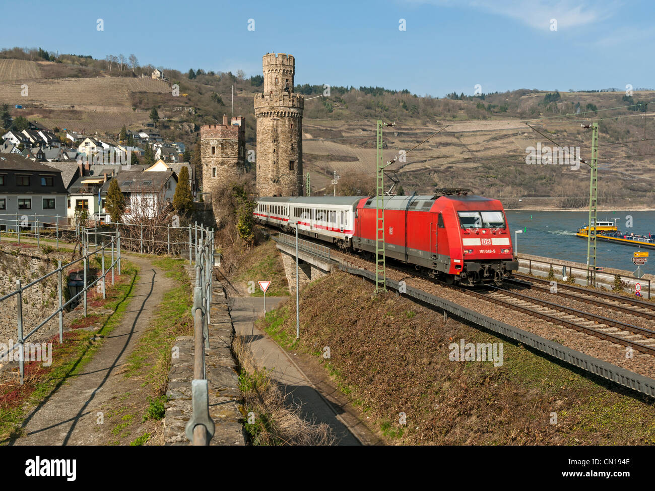 Train passing the medieval fortifications at Oberwesel in UNESCO listed ...