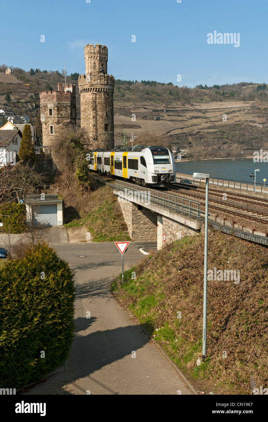Train passing the medieval fortifications at Oberwesel in UNESCO listed ...