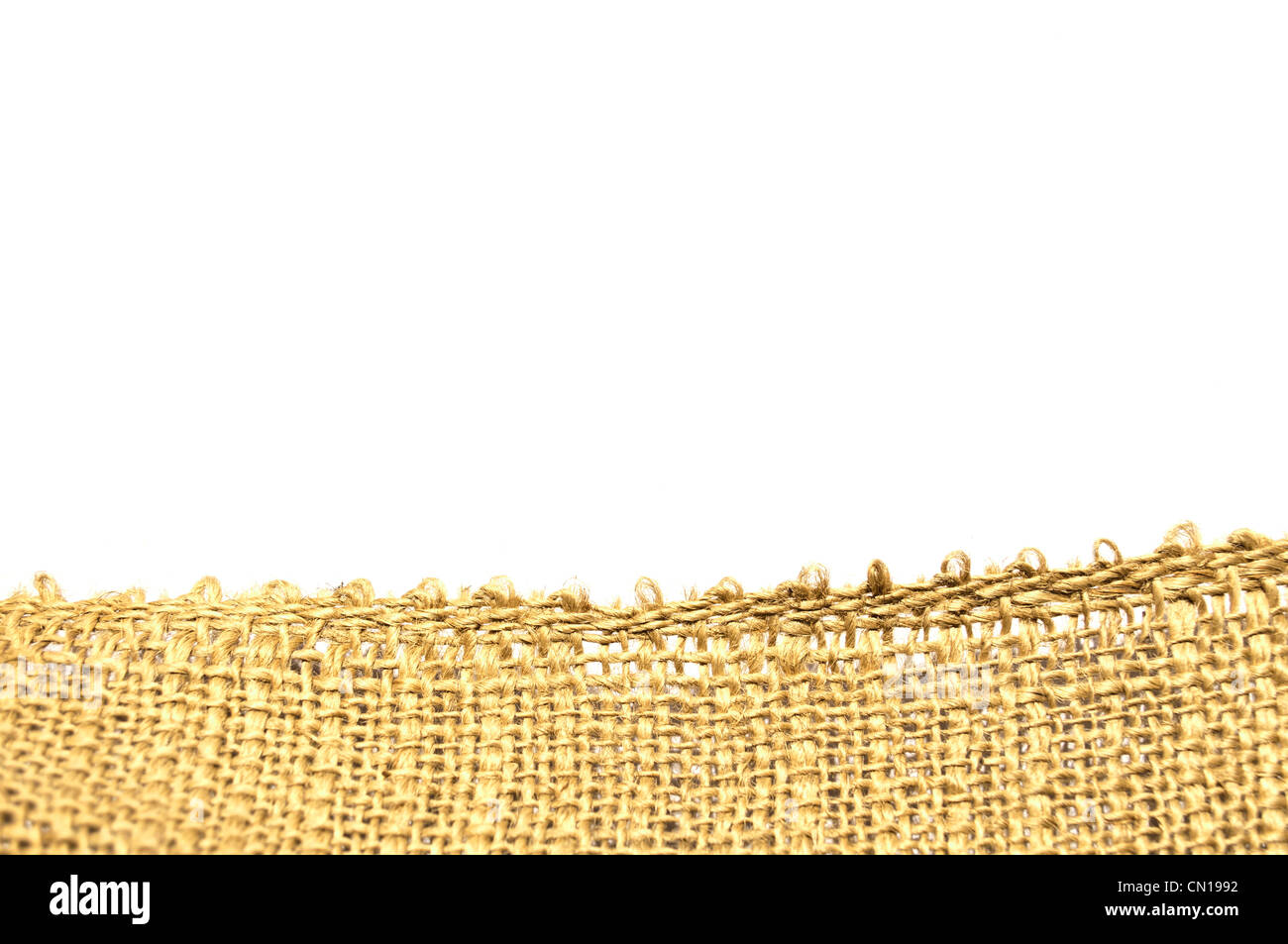 Close up of a yellow burlap isolated on white background Stock Photo ...