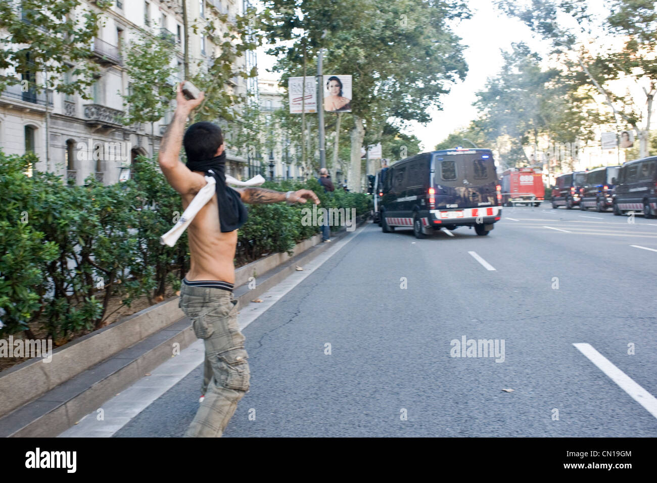Protester throwing stones hi-res stock photography and images - Alamy