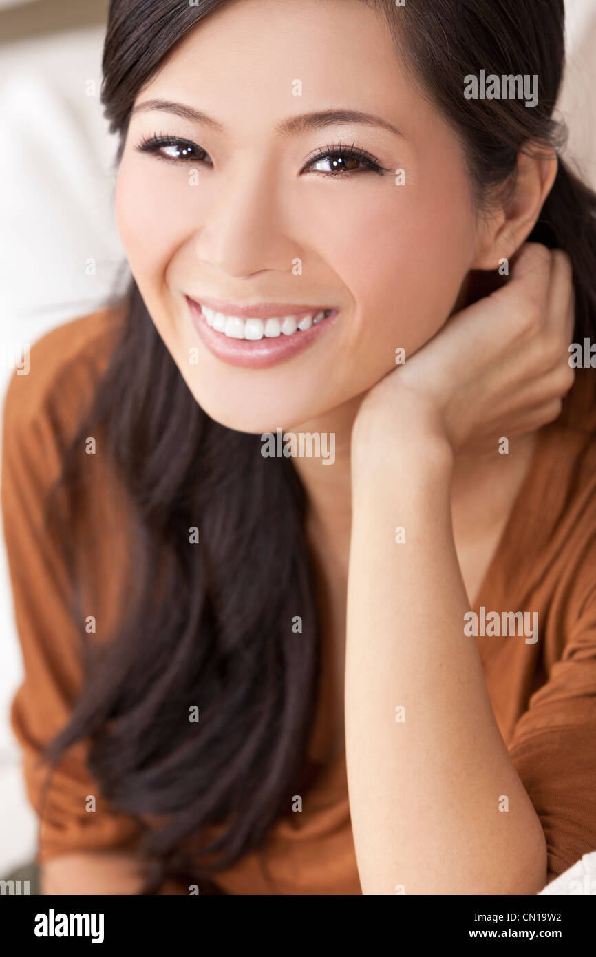 Close Up Portrait Of A Beautiful Happy Young Chinese Asian Oriental