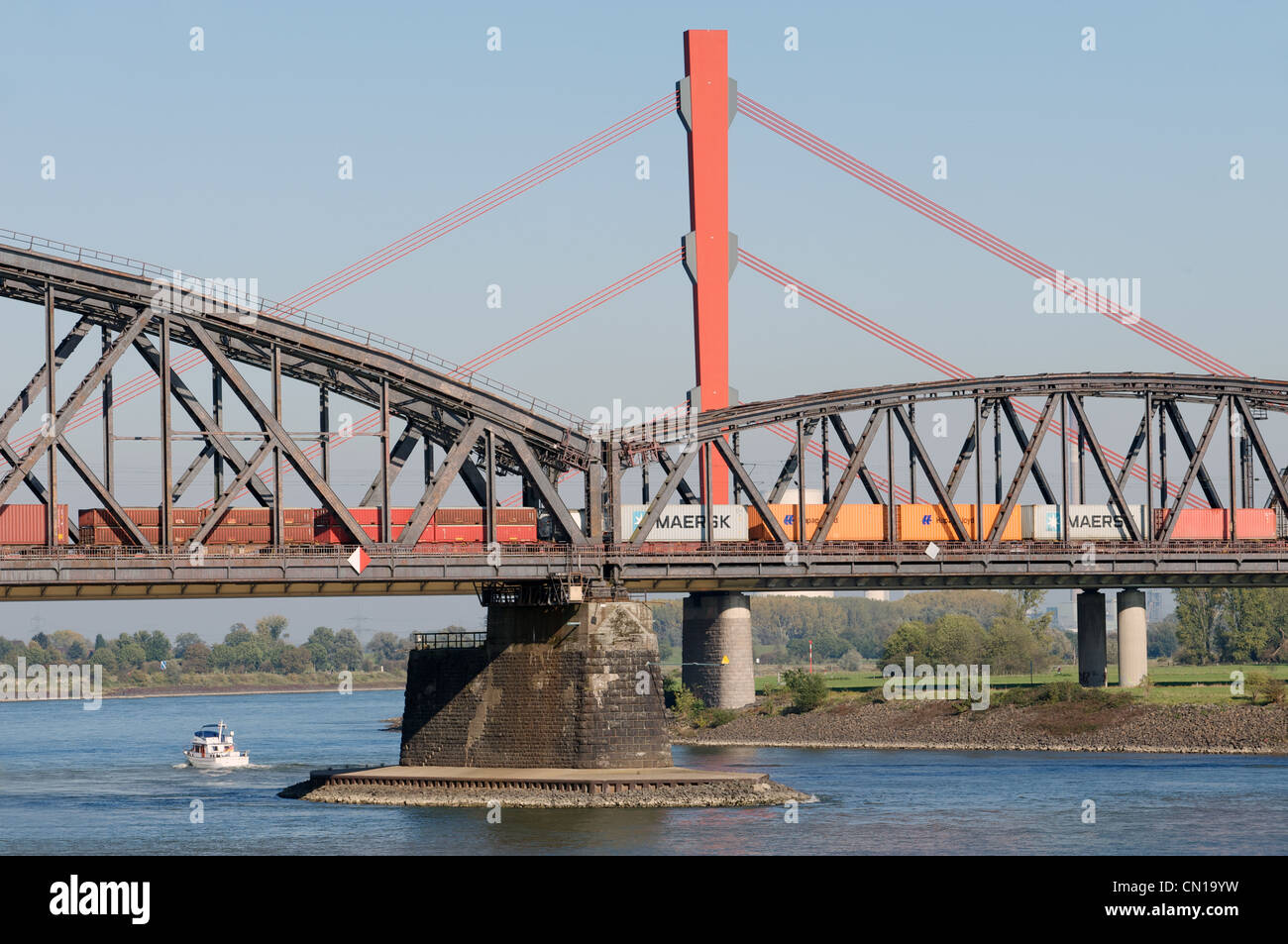 Freight train crossing the river Rhine, Duisburg Germany Stock Photo ...