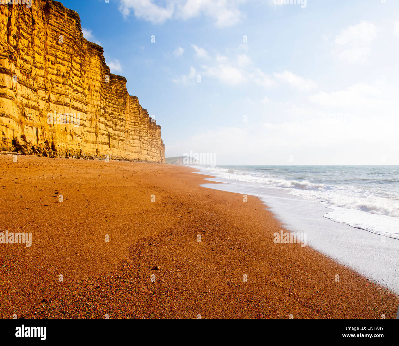The towering cliffs at West Bay on the Jurassic Coast of Dorset England ...