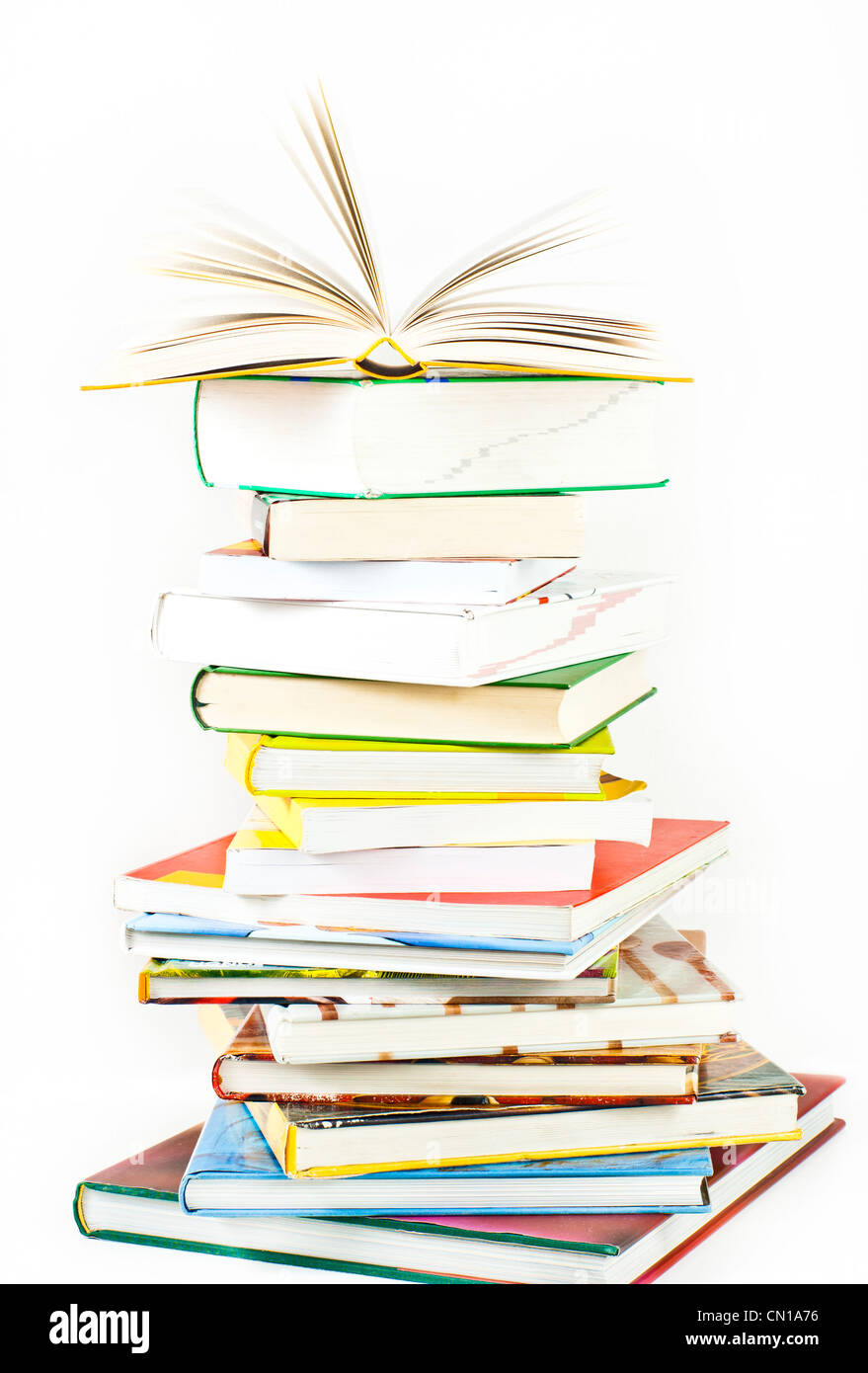 An open book on a stack of books Stock Photo - Alamy