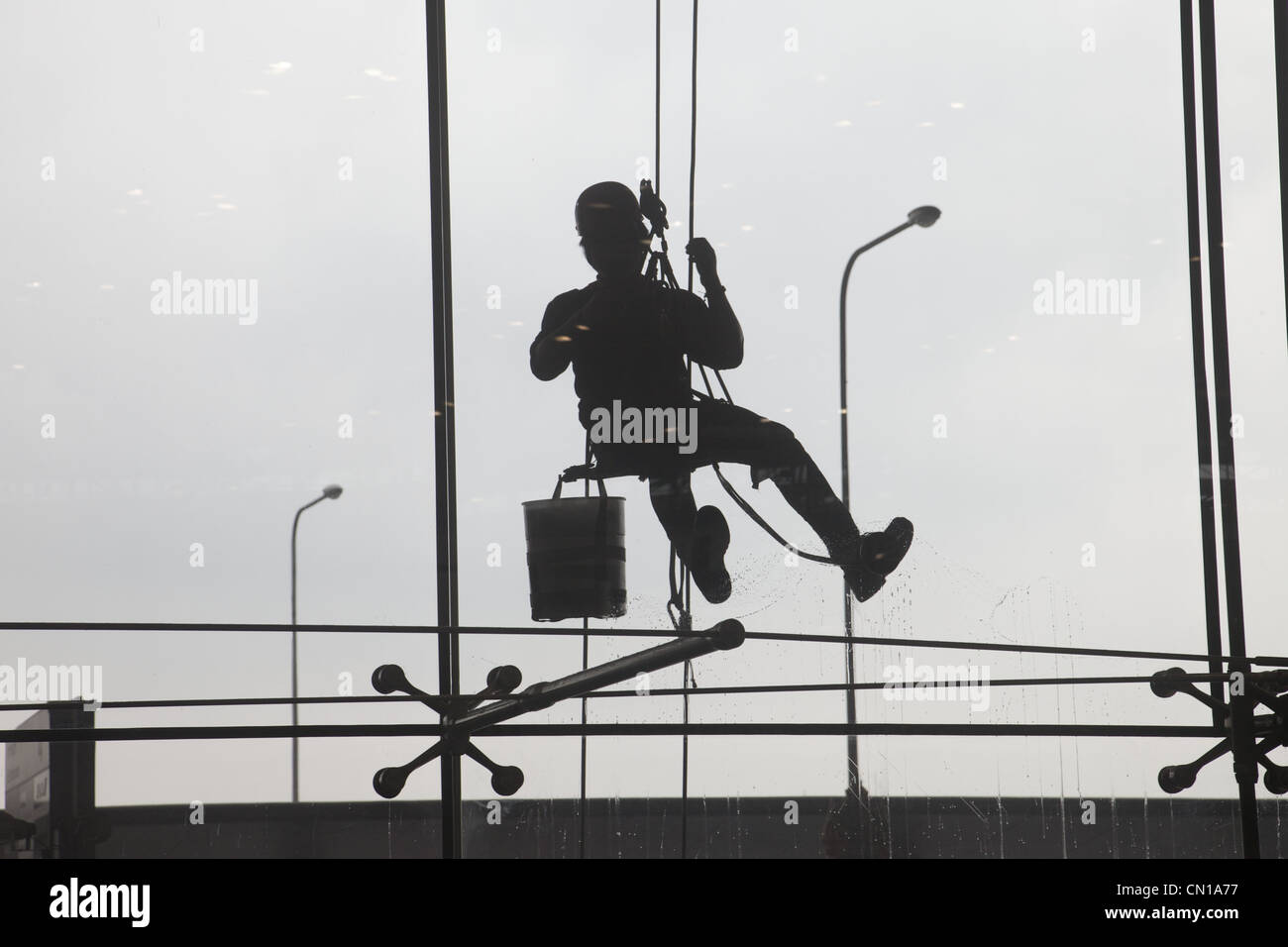 Cleaning the windows at Suvarnabhumi airport, Bangkok, Thailand Stock ...