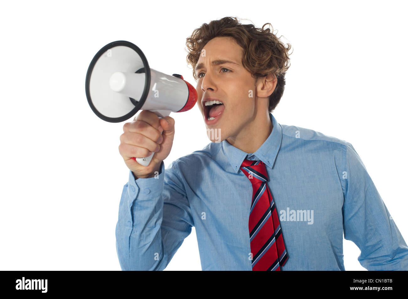 Businessman with megaphone isolated over white background Stock Photo ...