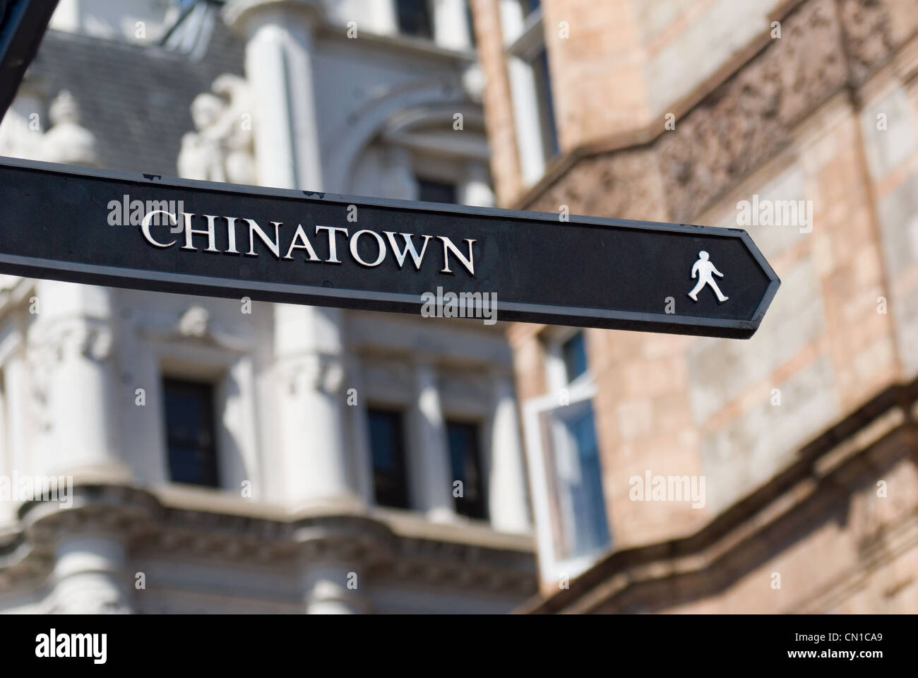 Chinatown Arrow Sign Stock Photo - Alamy