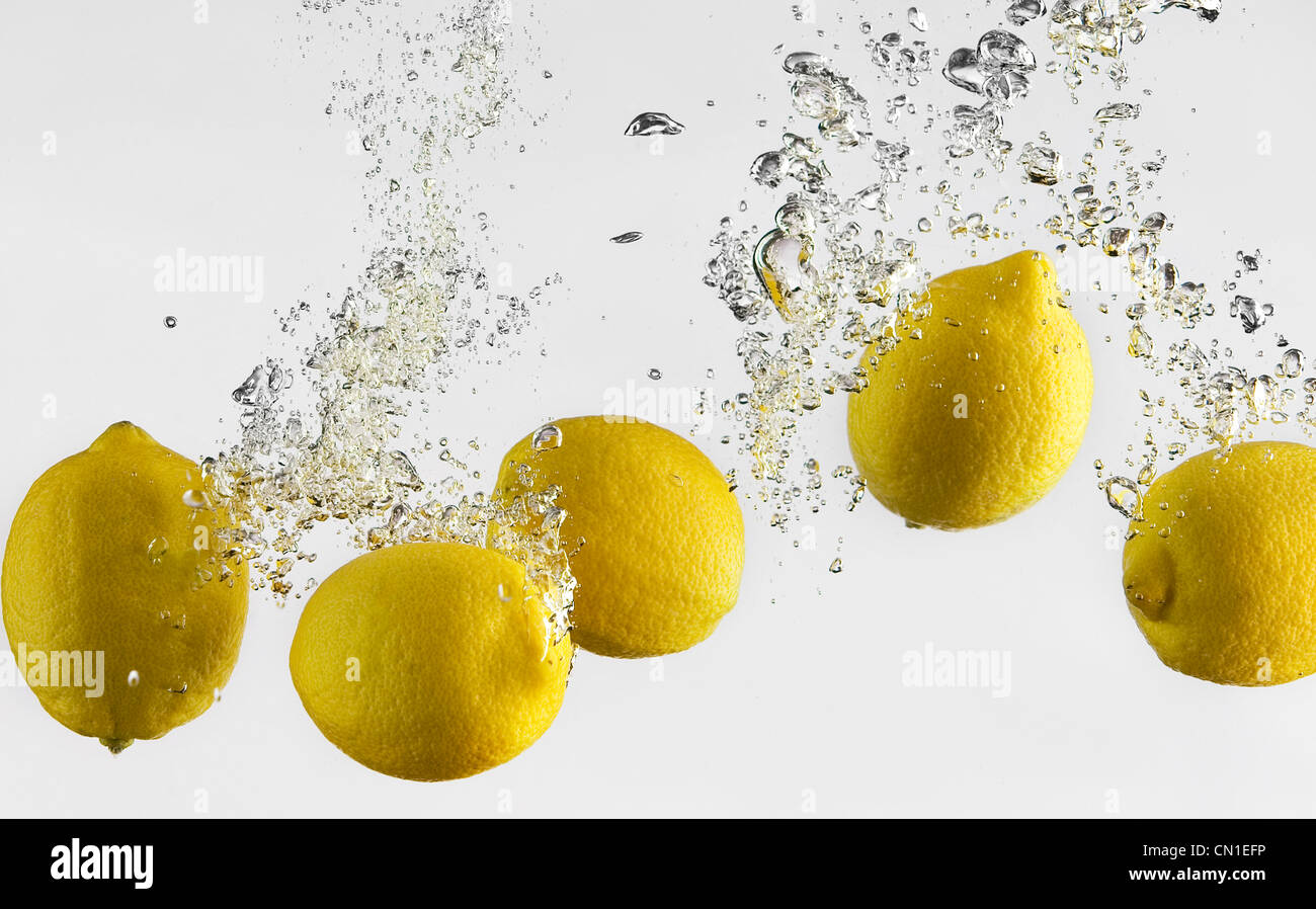 Five Lemons in Water Stock Photo - Alamy