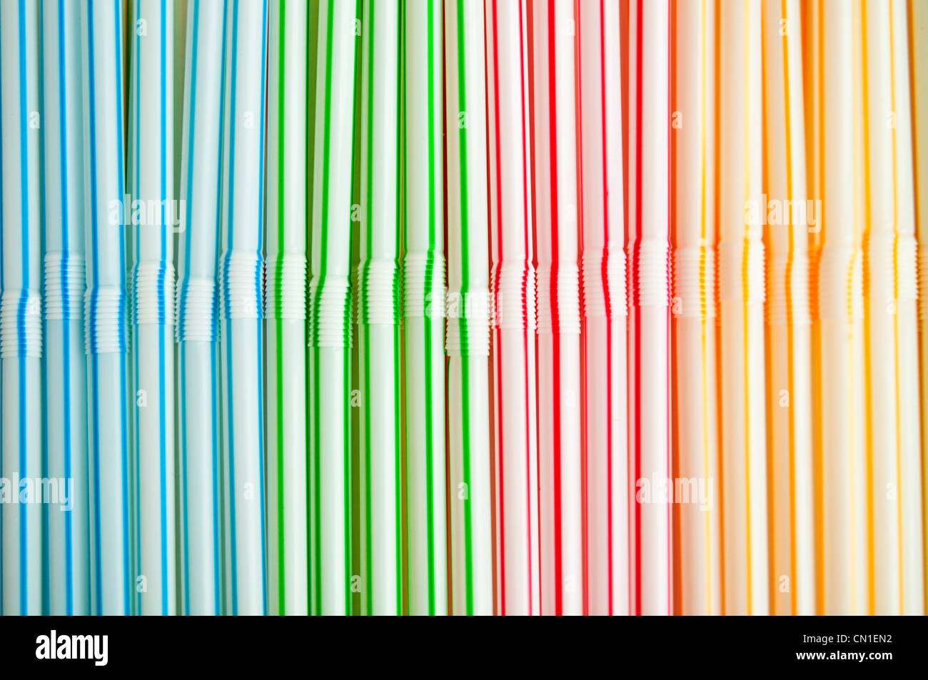 Colorful drinking straws background Stock Photo - Alamy