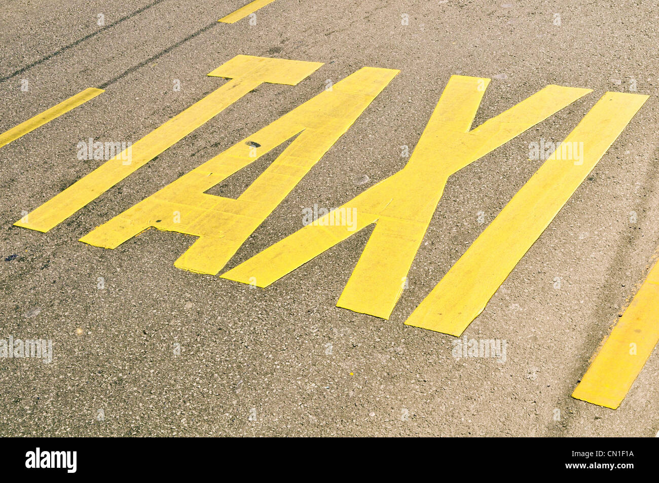 Taxi stand sign painted on the street Stock Photo - Alamy