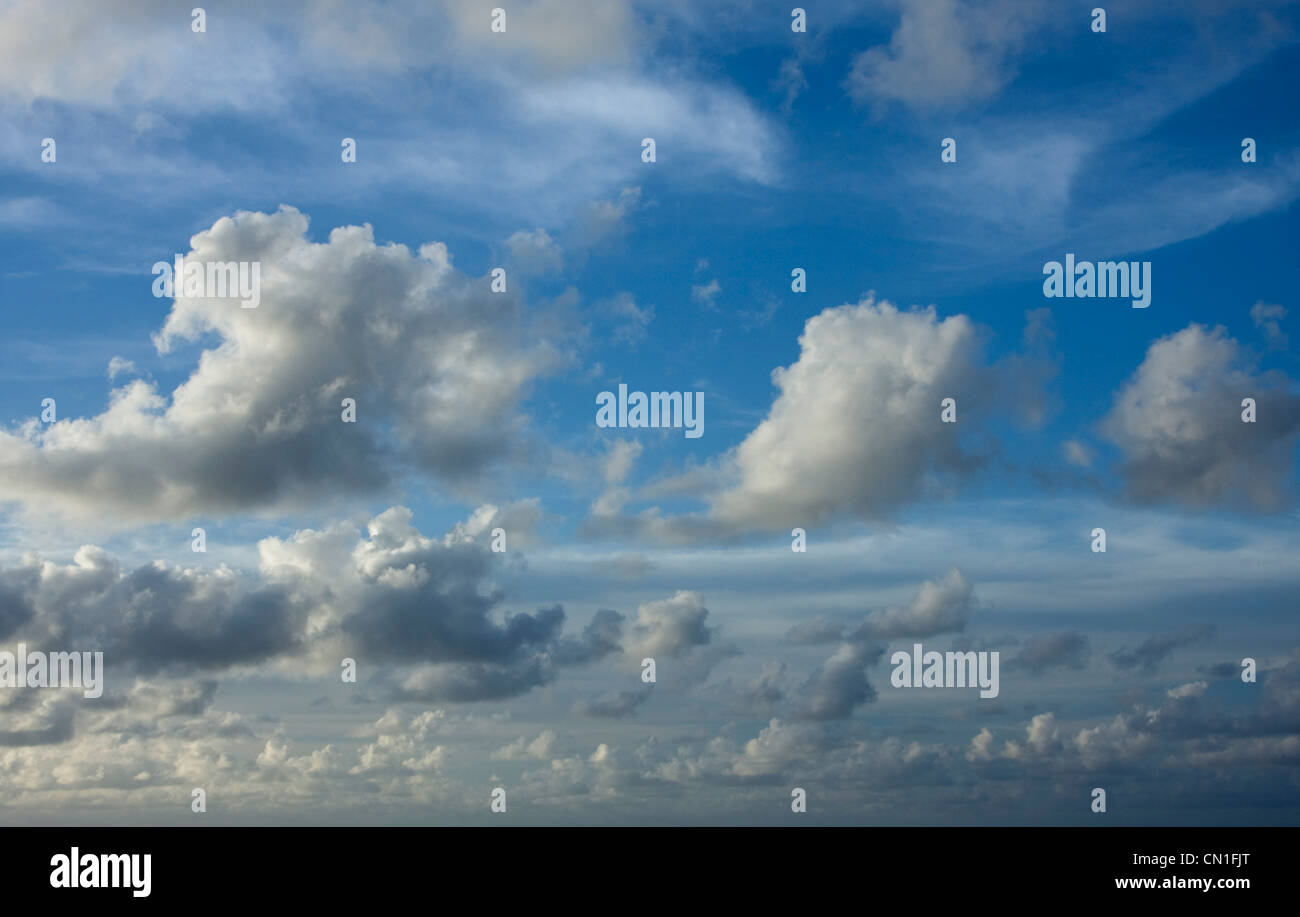 Blue Sky and Fluffy White Clouds Stock Photo - Alamy