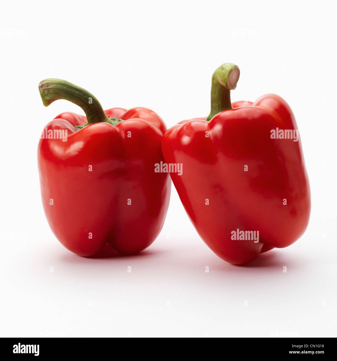 Two Red Bell Peppers Stock Photo - Alamy