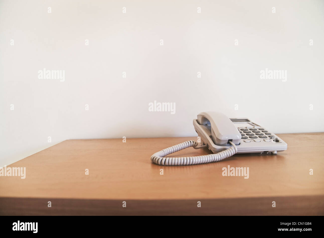 Telephone on Desk Stock Photo - Alamy