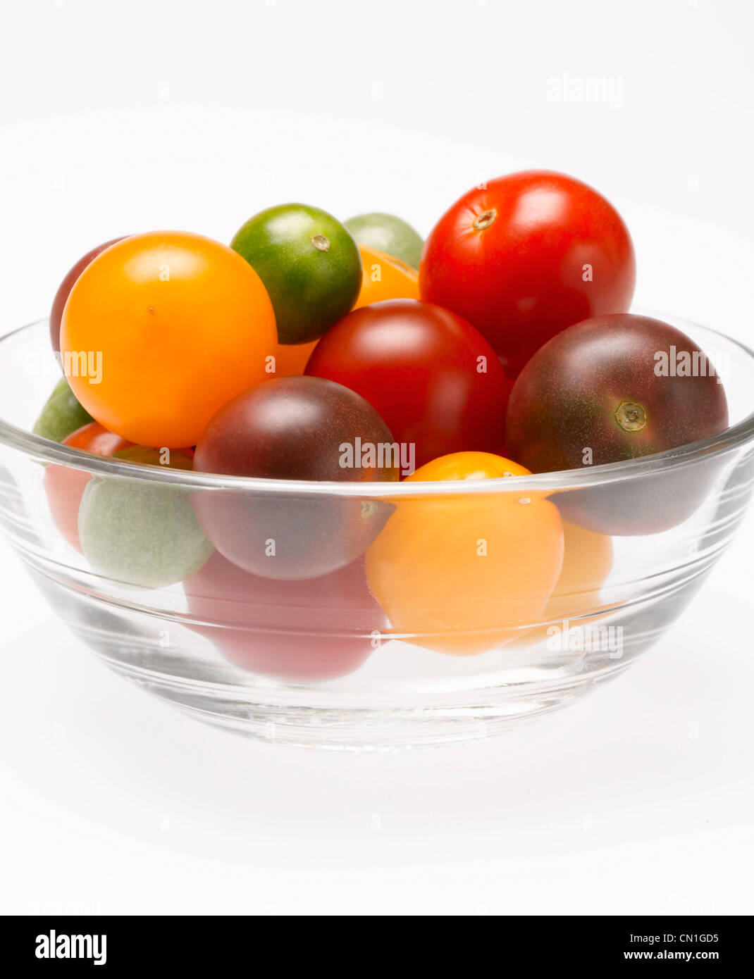 Bowl of Heirloom Cherry Tomatoes from Side Stock Photo - Alamy