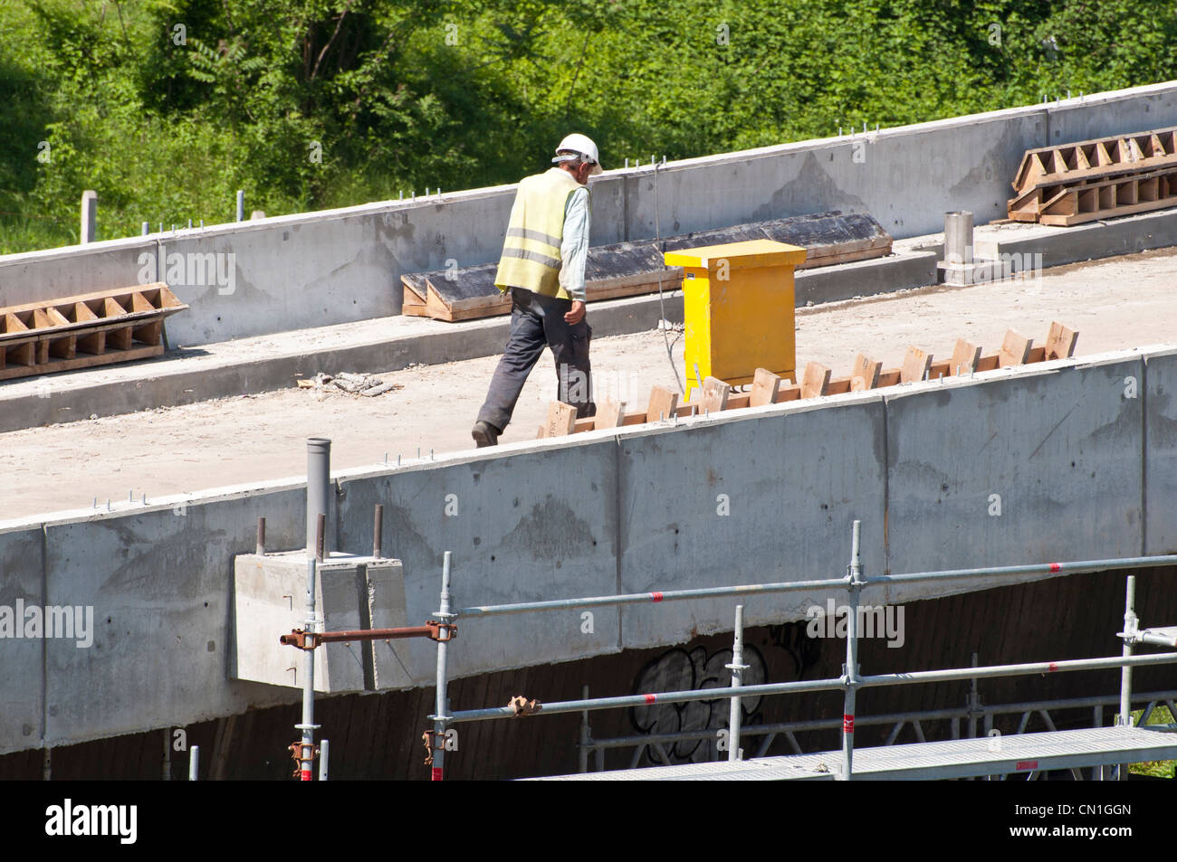 Worker on construction site Stock Photo - Alamy