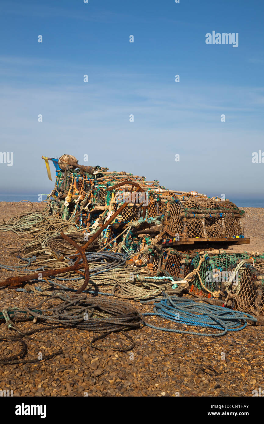 fishing pots stacked on the shingle ready for next fishing trip Stock ...