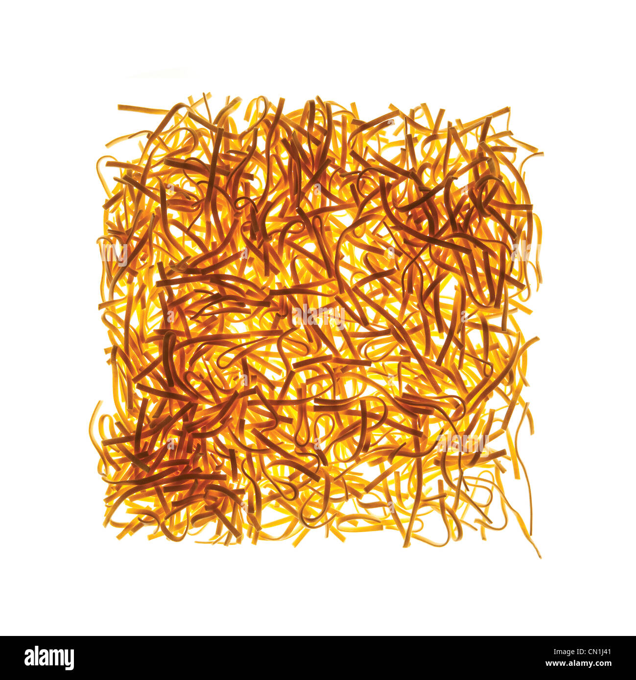Uncooked noodles in square Cut Out Stock Images & Pictures - Alamy