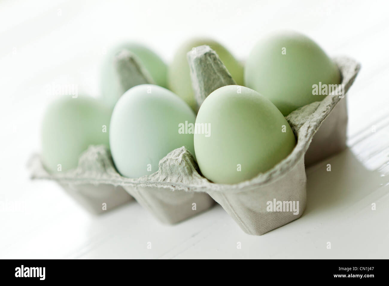 Six Blue Eggs in Carton Stock Photo - Alamy