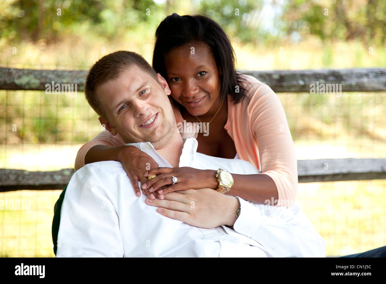 Smiling Engaged Couple Stock Photo - Alamy