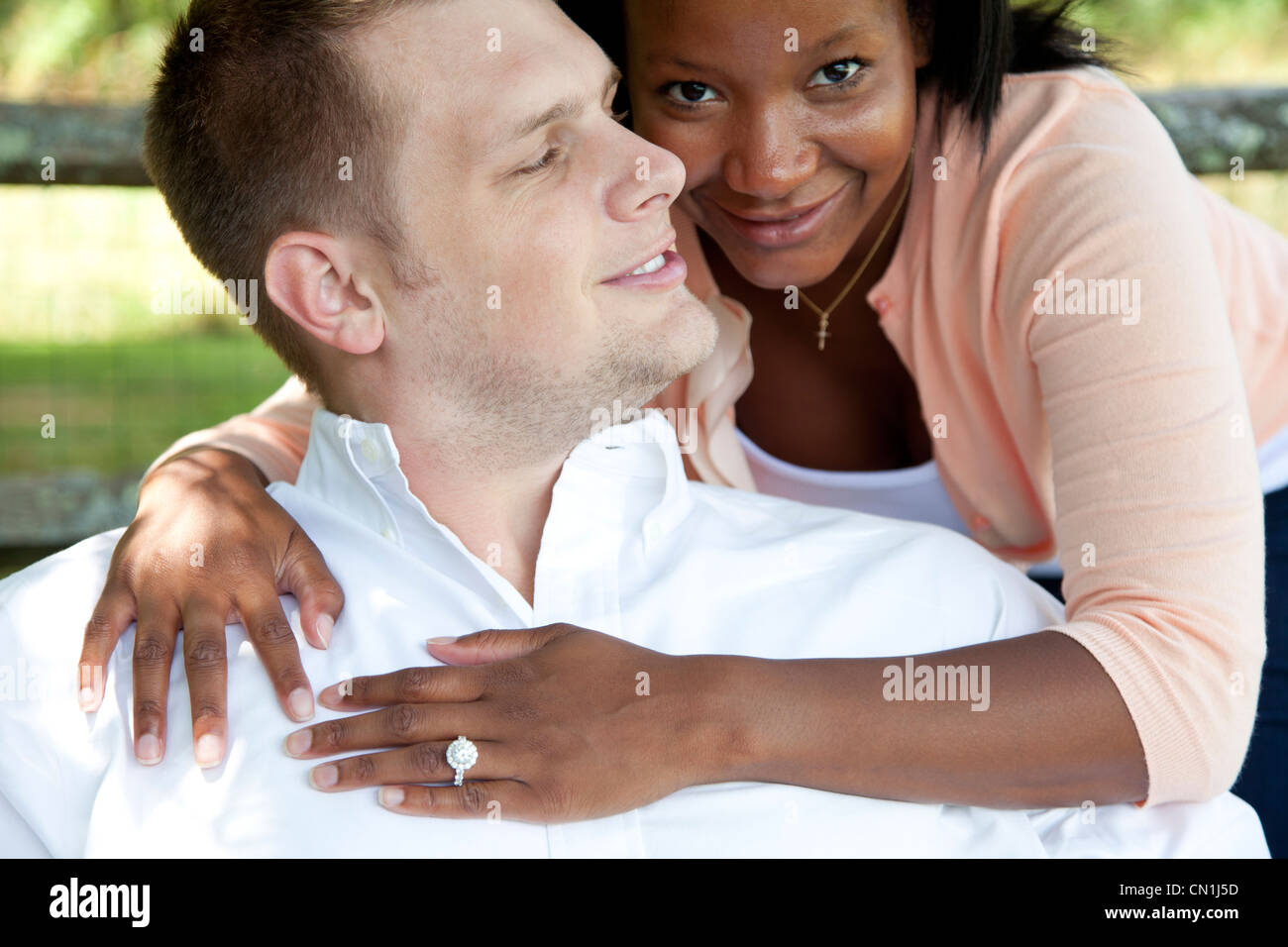 Smiling Engaged Couple Stock Photo - Alamy