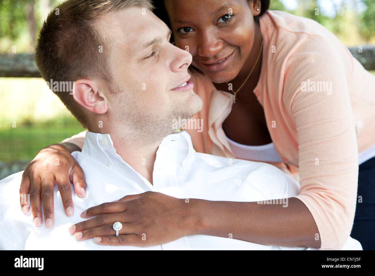 Smiling Engaged Couple Stock Photo - Alamy