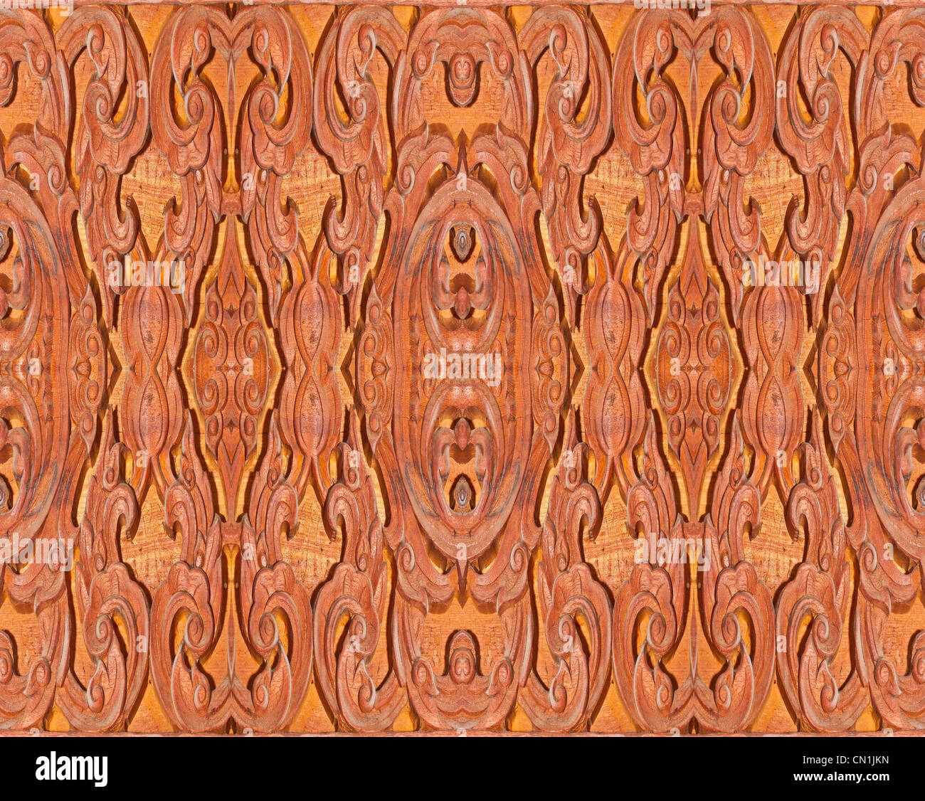 Native art carved on the wall in the temple Stock Photo - Alamy