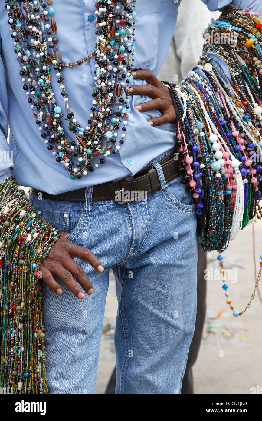 Indian Man street vendor selling beaded necklaces streets of Delhi ...