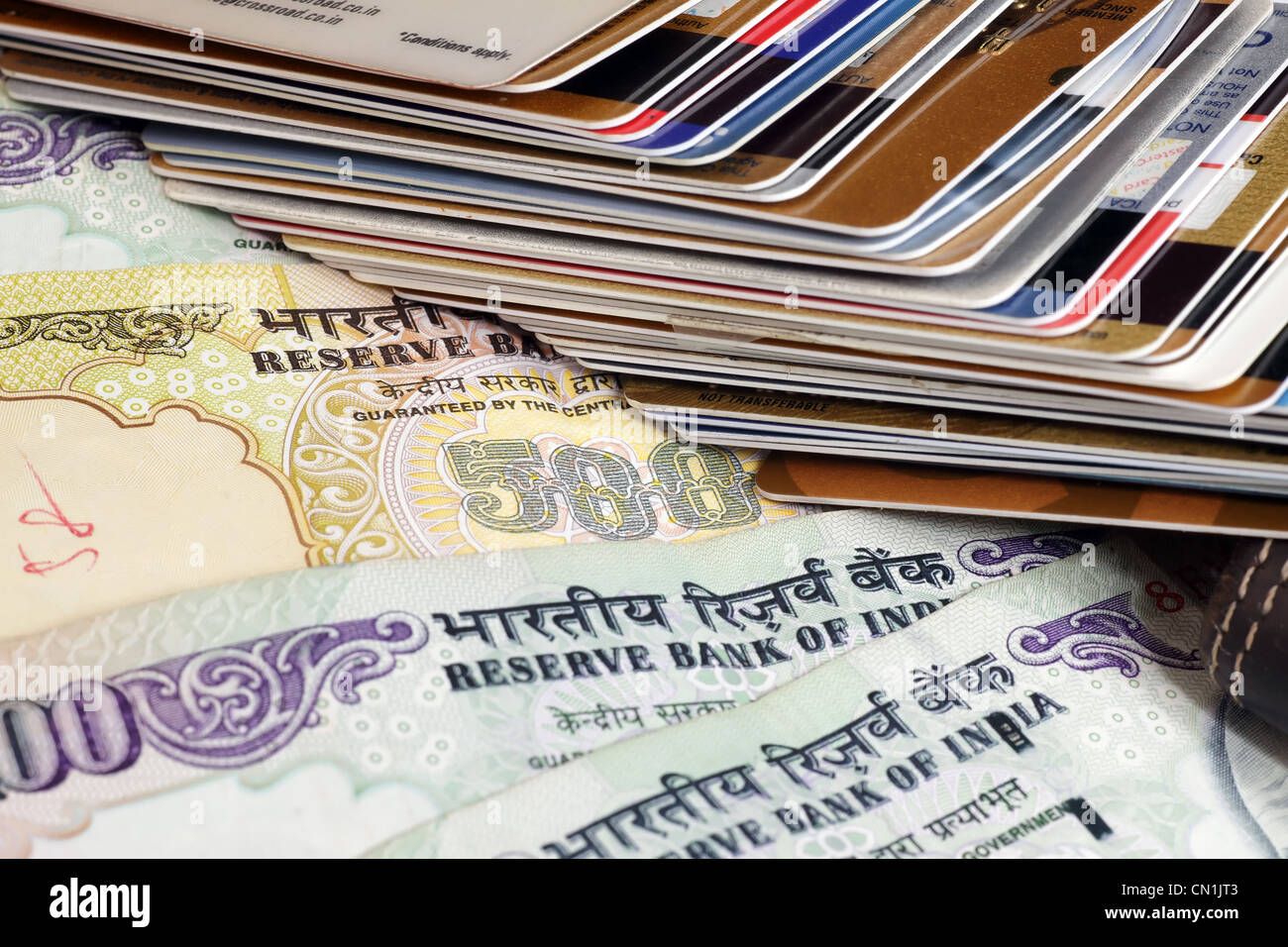 Credit cards on Indian rupees Stock Photo - Alamy