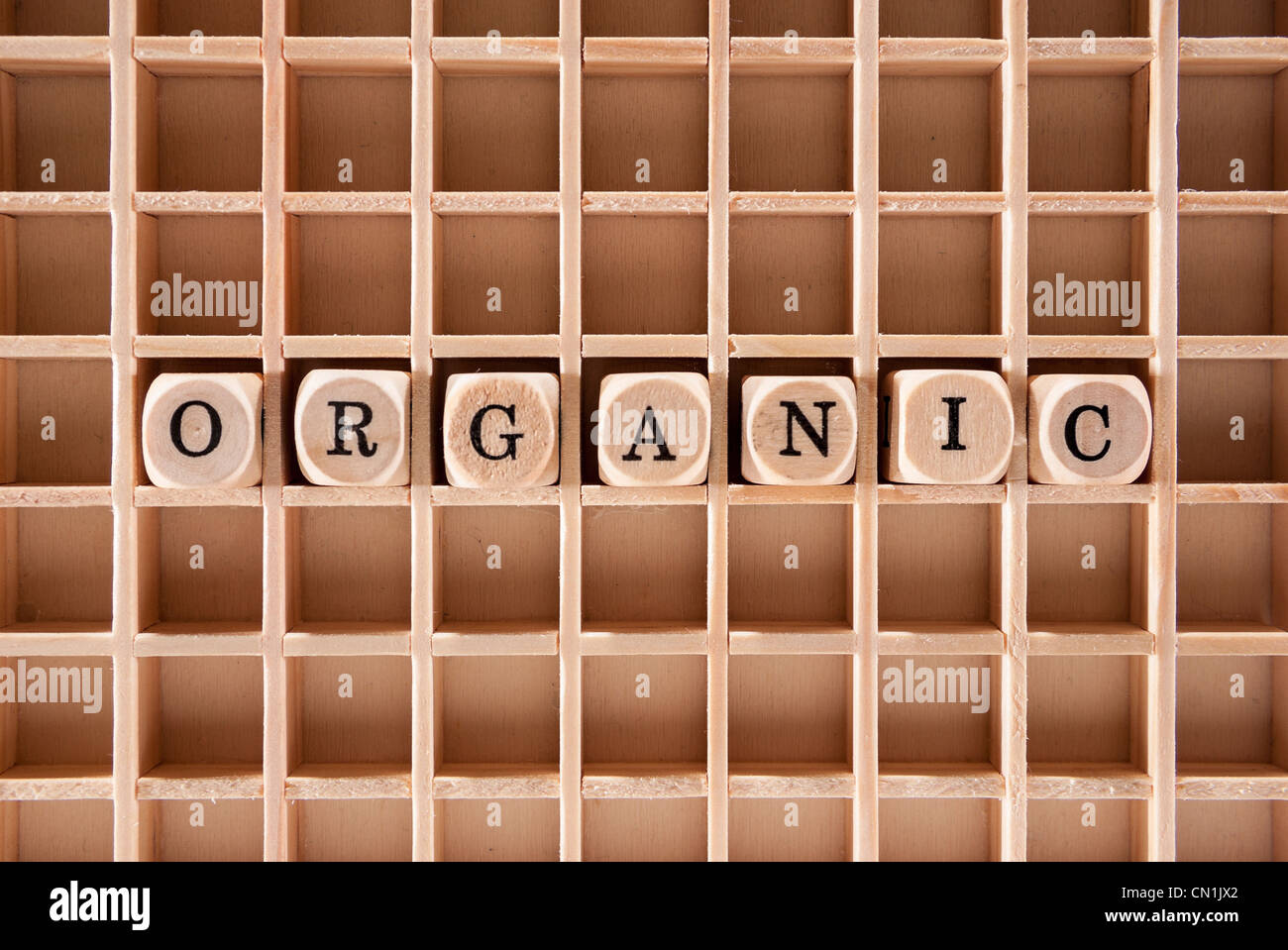 Organic word construction with letter blocks / cubes and a shallow ...