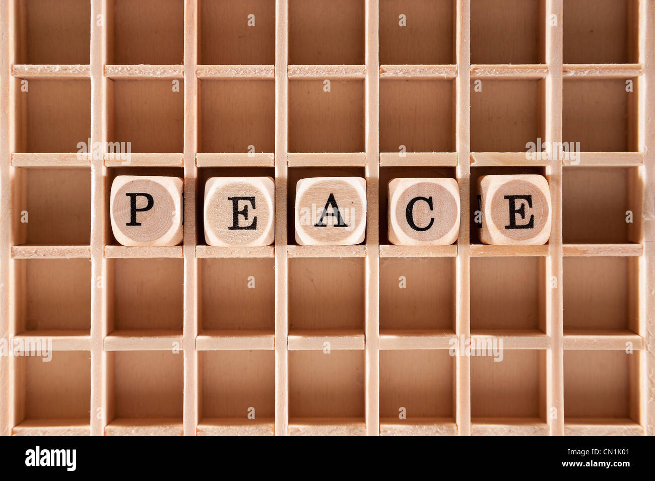 Peace word construction with letter blocks / cubes and a shallow depth ...