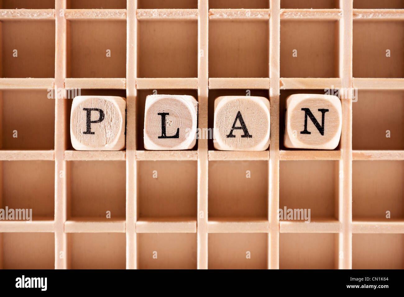 Plan word construction with letter blocks / cubes and a shallow depth ...