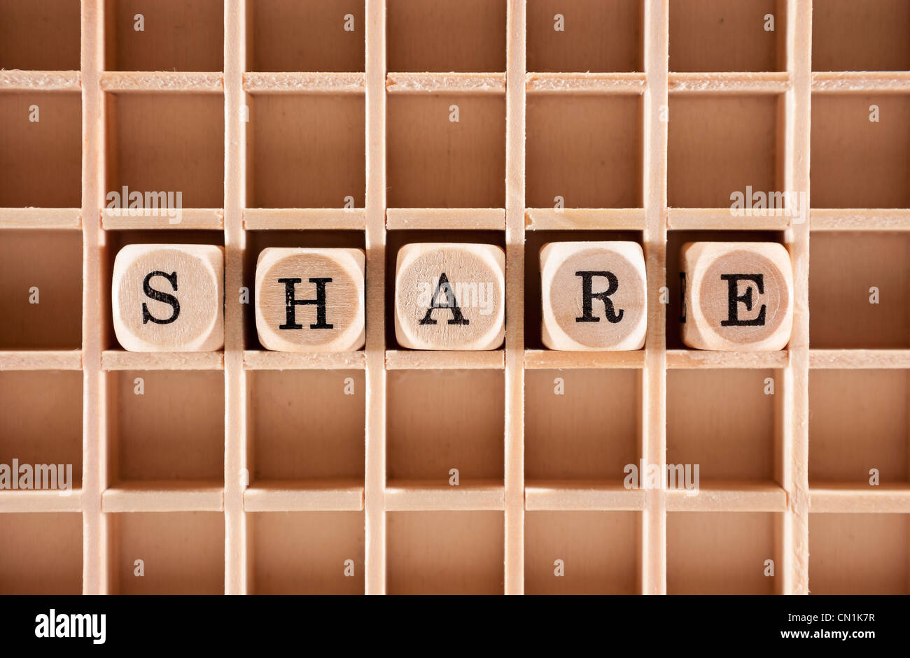 Share word construction with letter blocks / cubes and a shallow depth ...