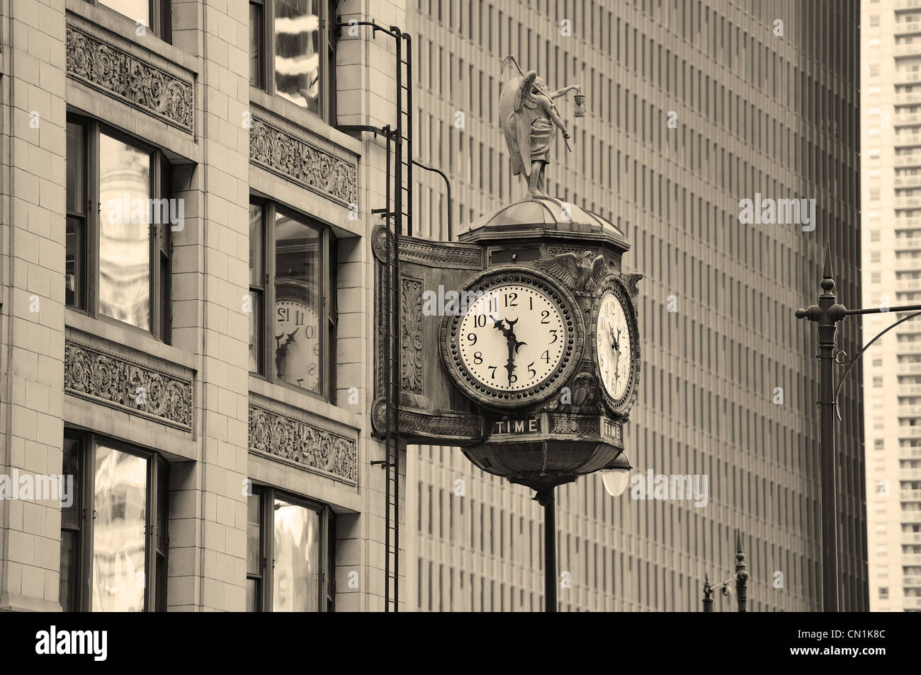 Chicago downtown street view with old fashion clock and skyscraper ...