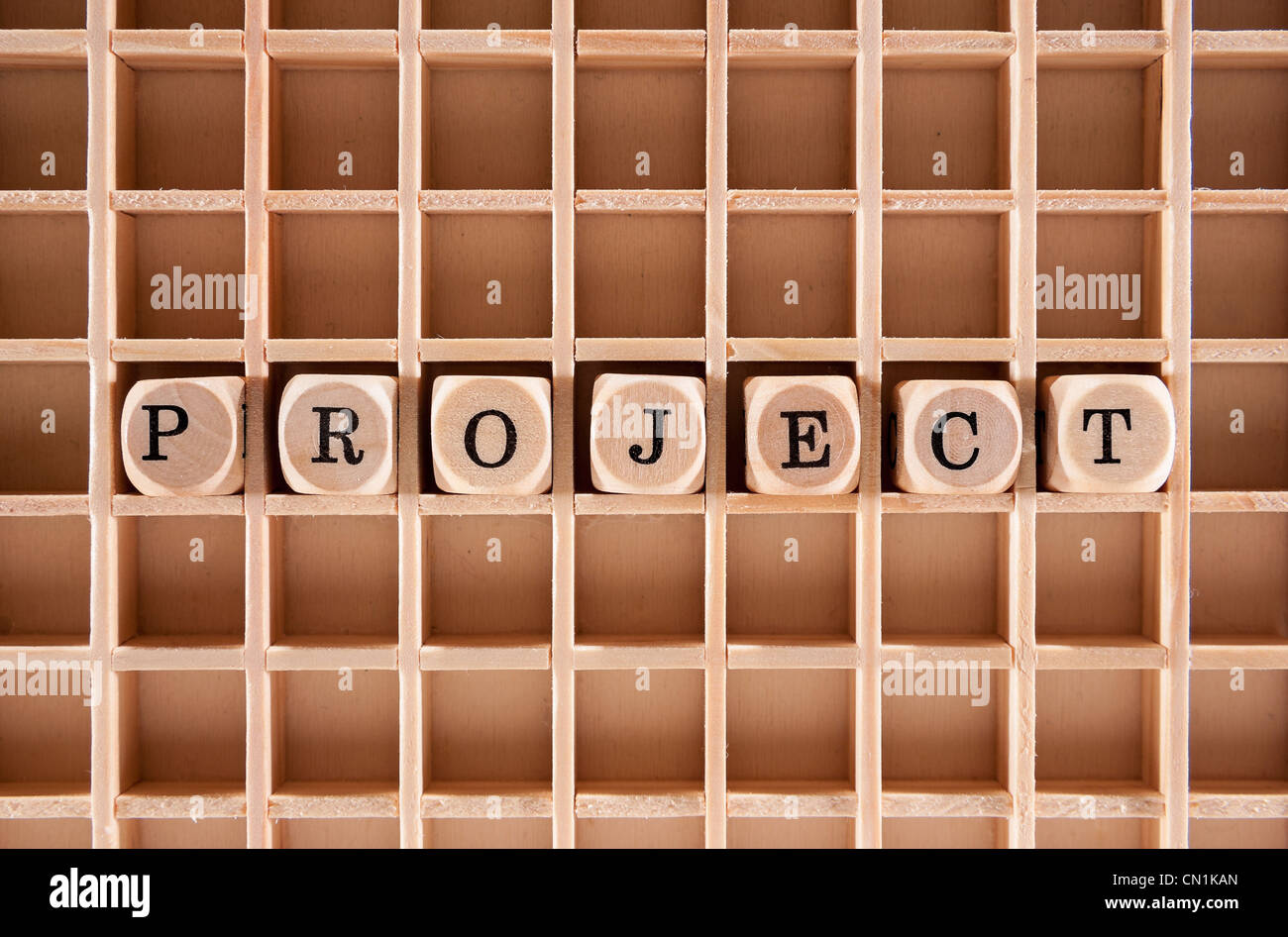 Project word construction with letter blocks / cubes and a shallow ...