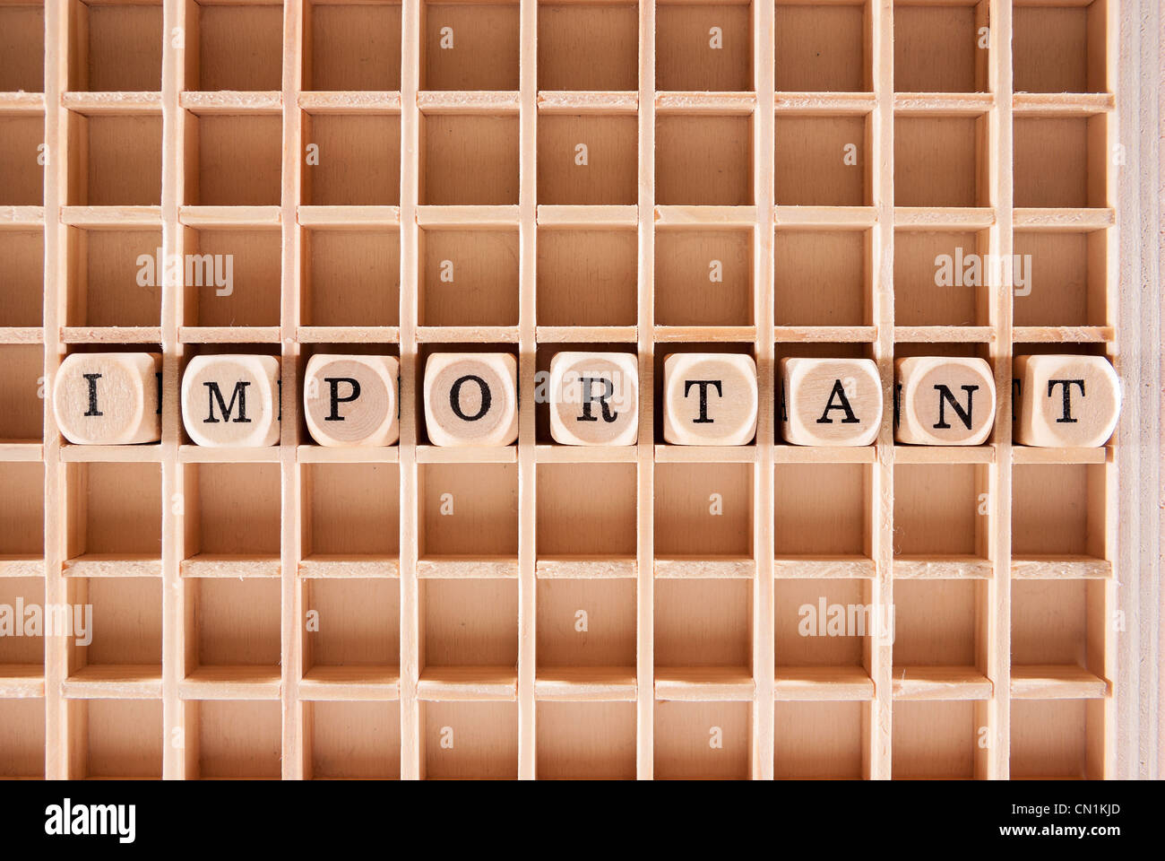 Important word construction with letter blocks / cubes and a shallow ...