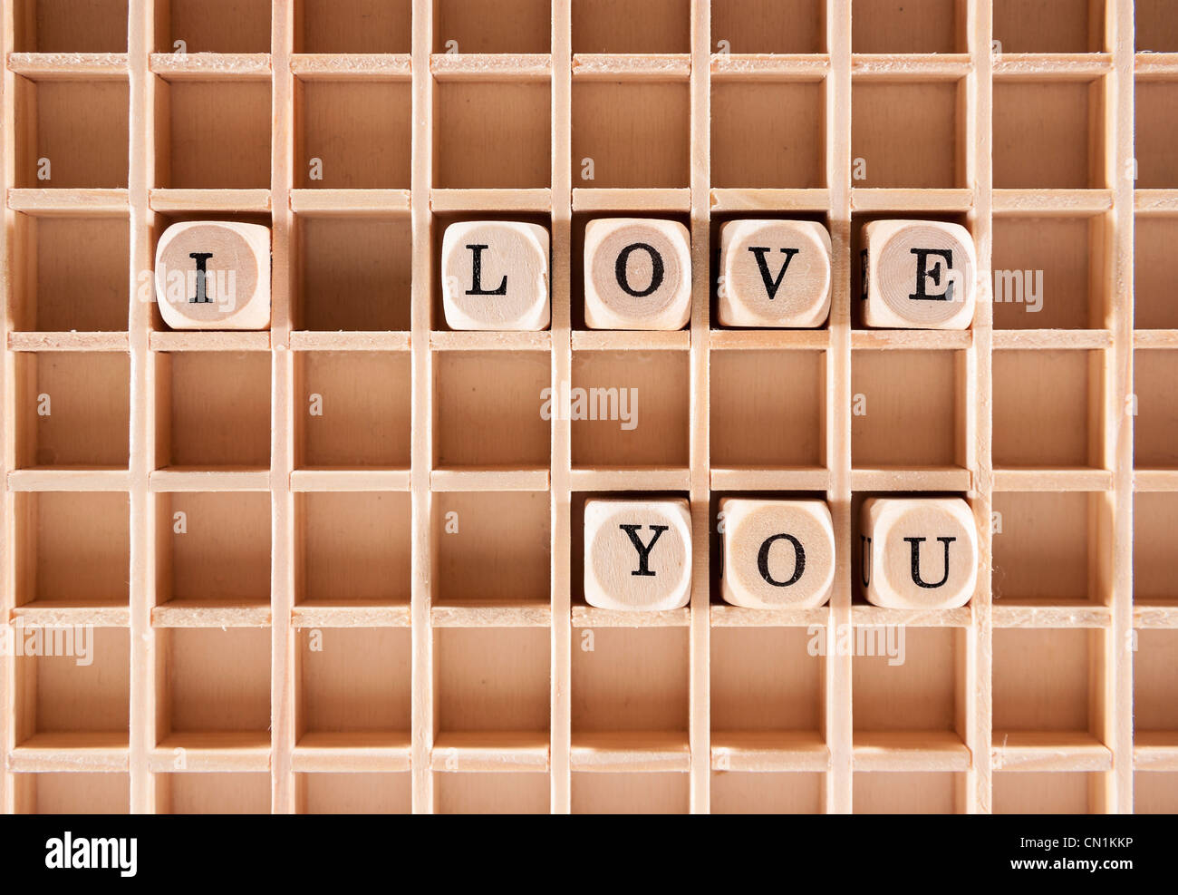 I love you words construction with letter blocks / cubes, a heart and a ...