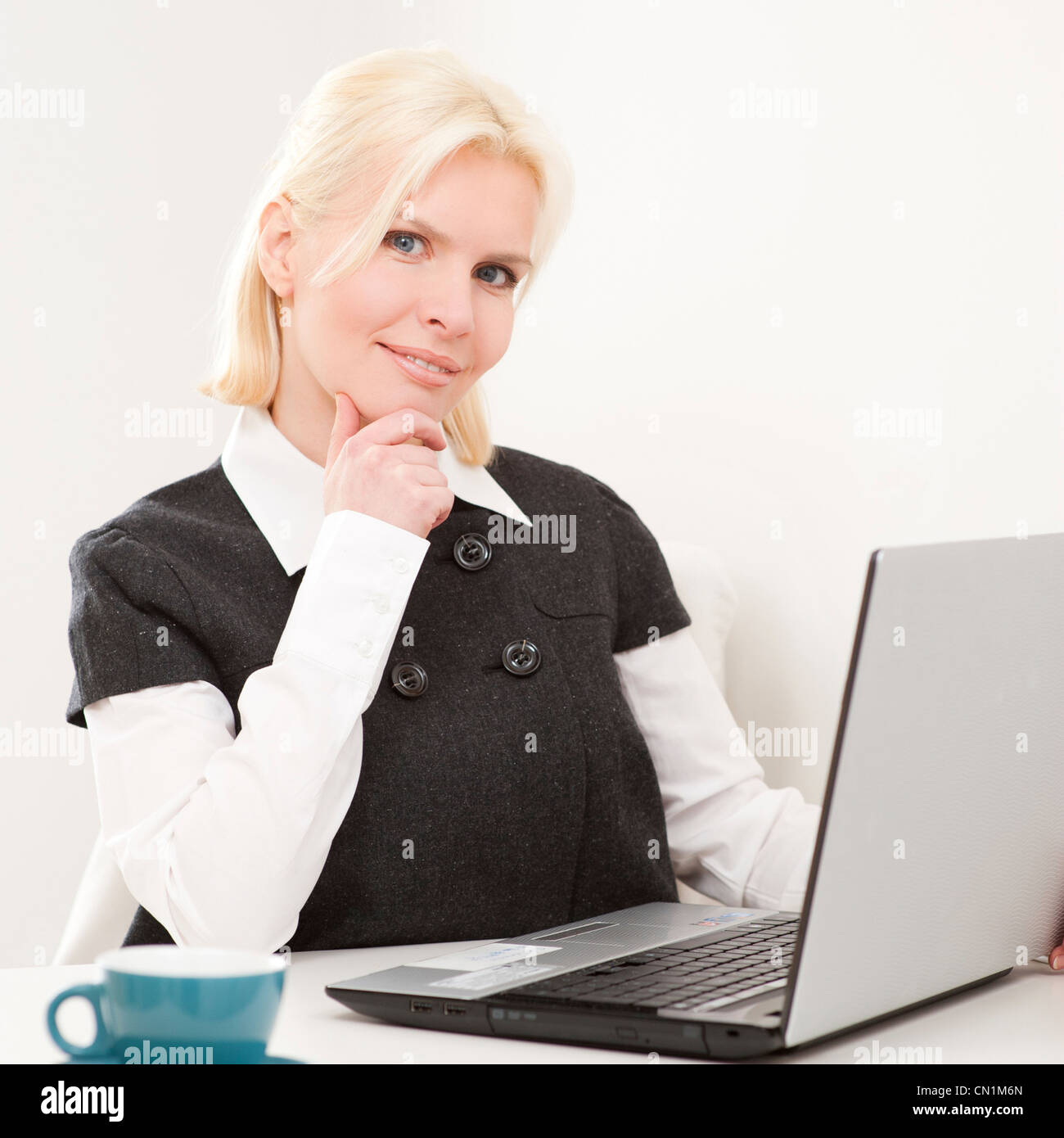 Young and beautiful business woman at work Stock Photo - Alamy