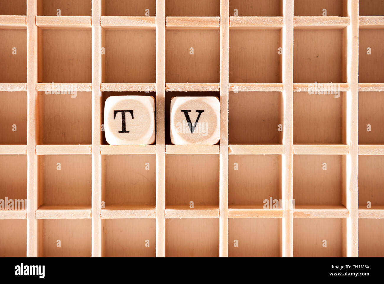 TV word construction with letter blocks / cubes and a shallow depth of ...