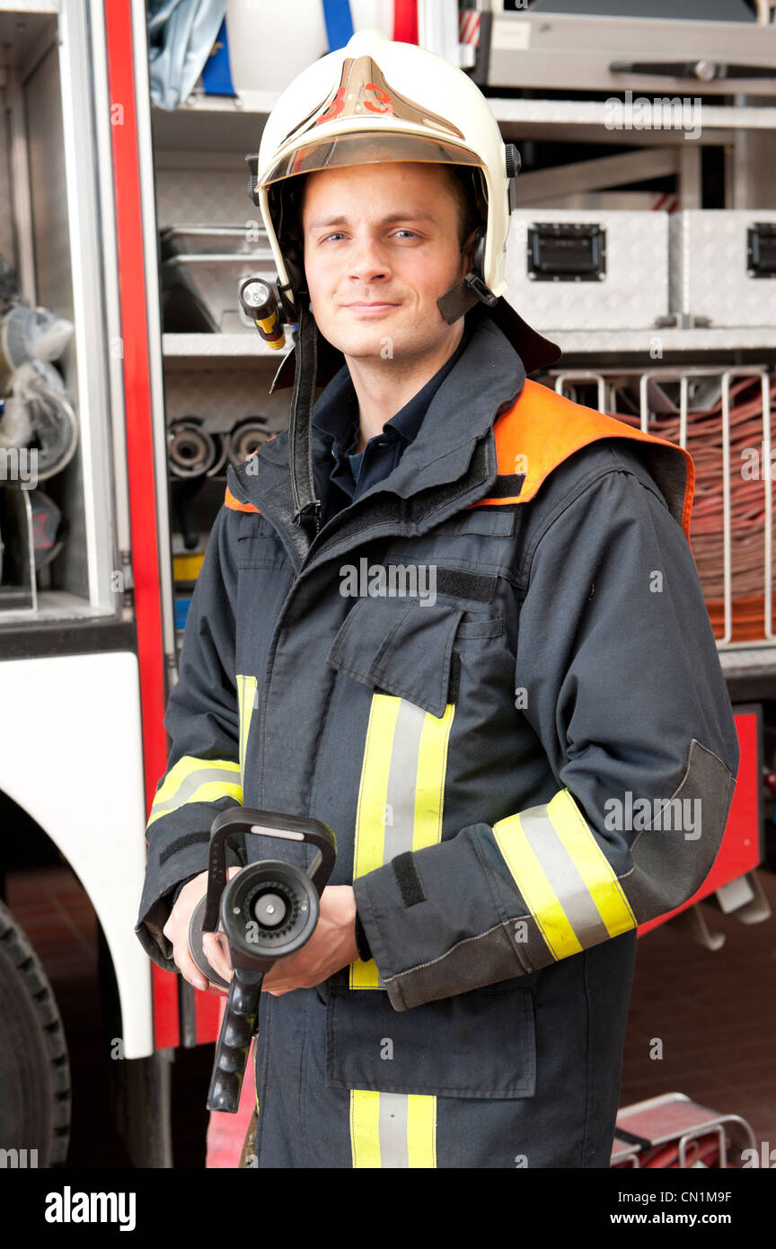 Firefighter black truck smiling hi-res stock photography and images - Alamy