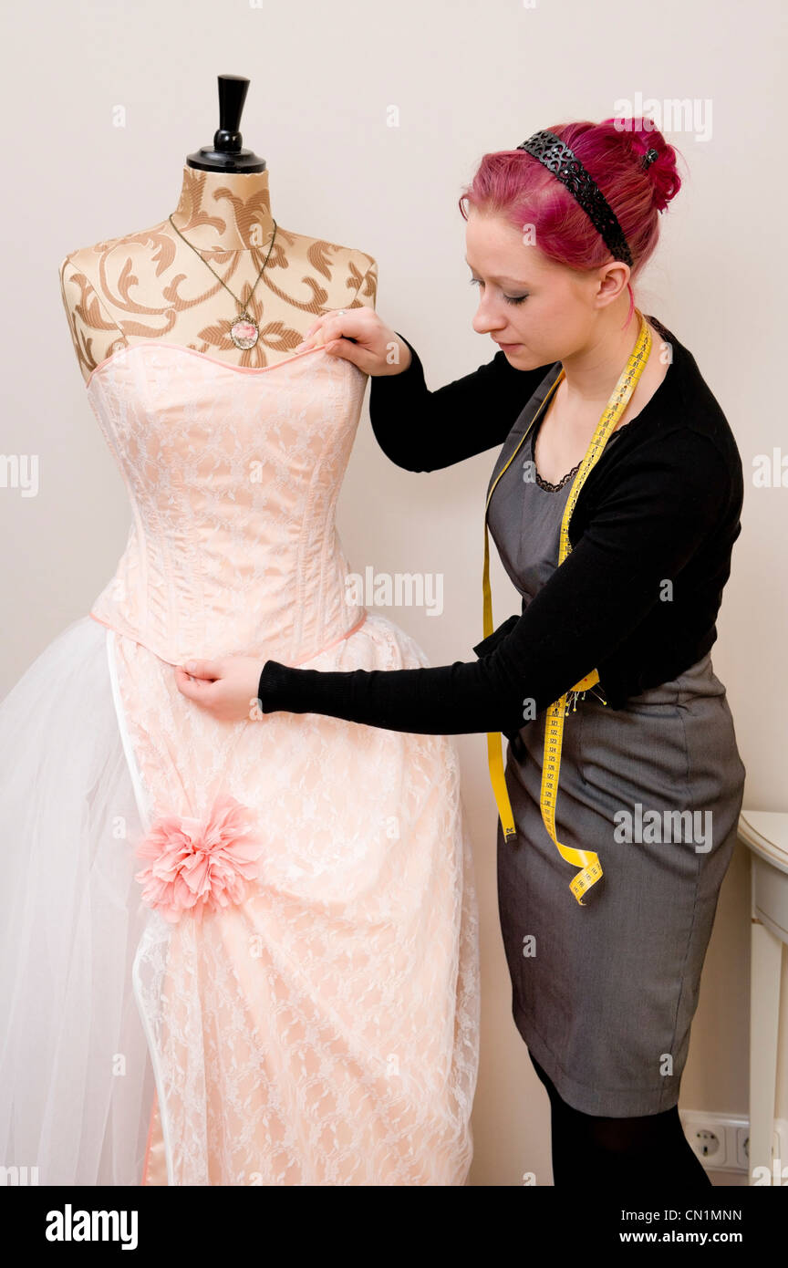 Young dressmaker in her studio Stock Photo - Alamy
