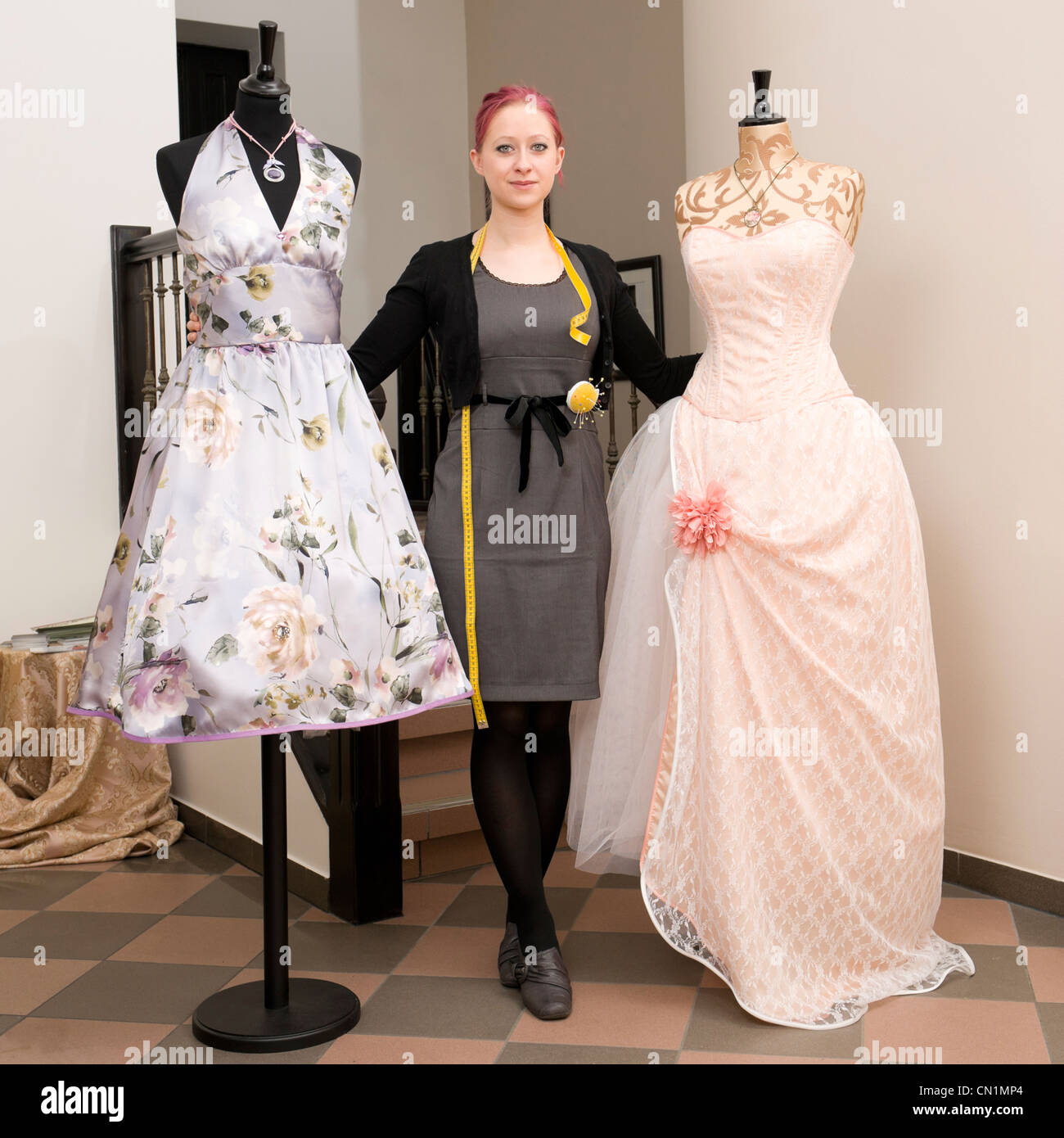 Young dressmaker in her studio Stock Photo - Alamy