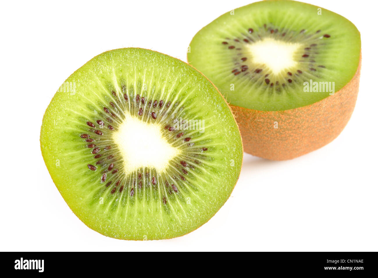 Ripe kiwi on white background Stock Photo - Alamy