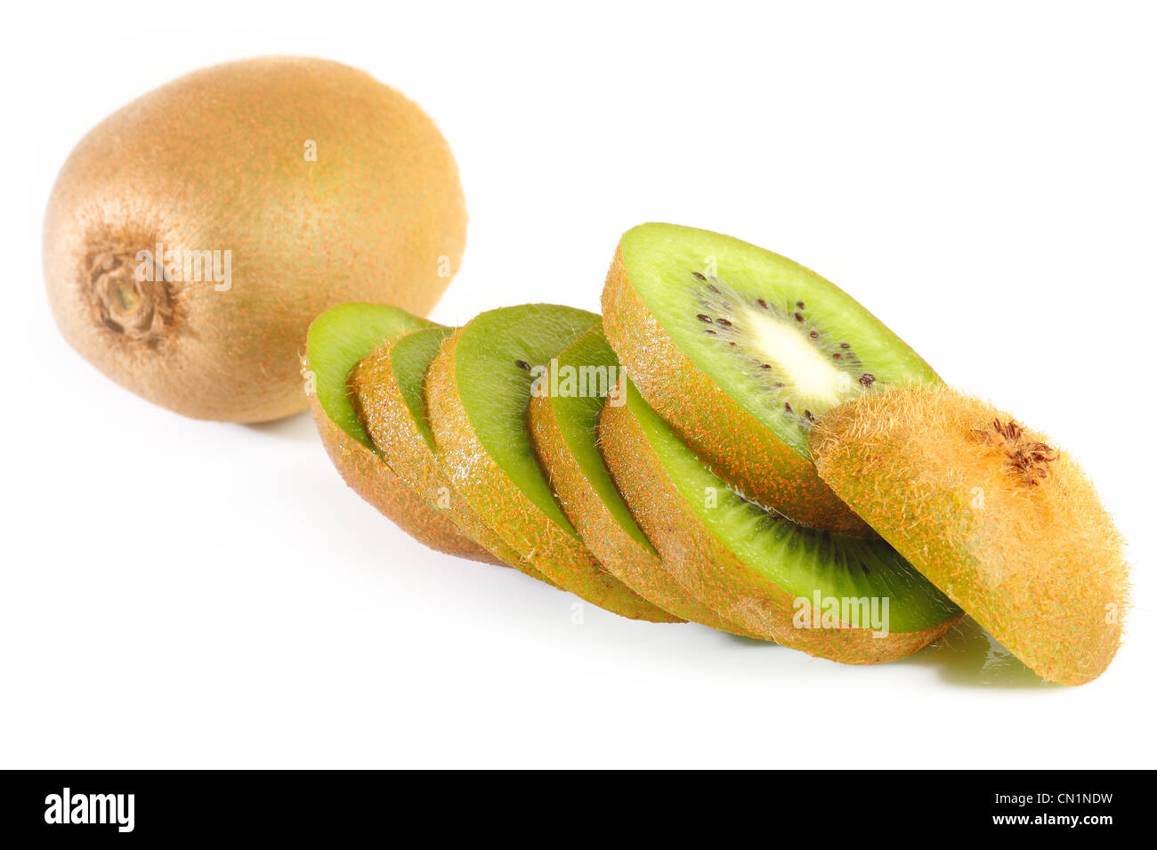 Ripe kiwi on white background Stock Photo - Alamy