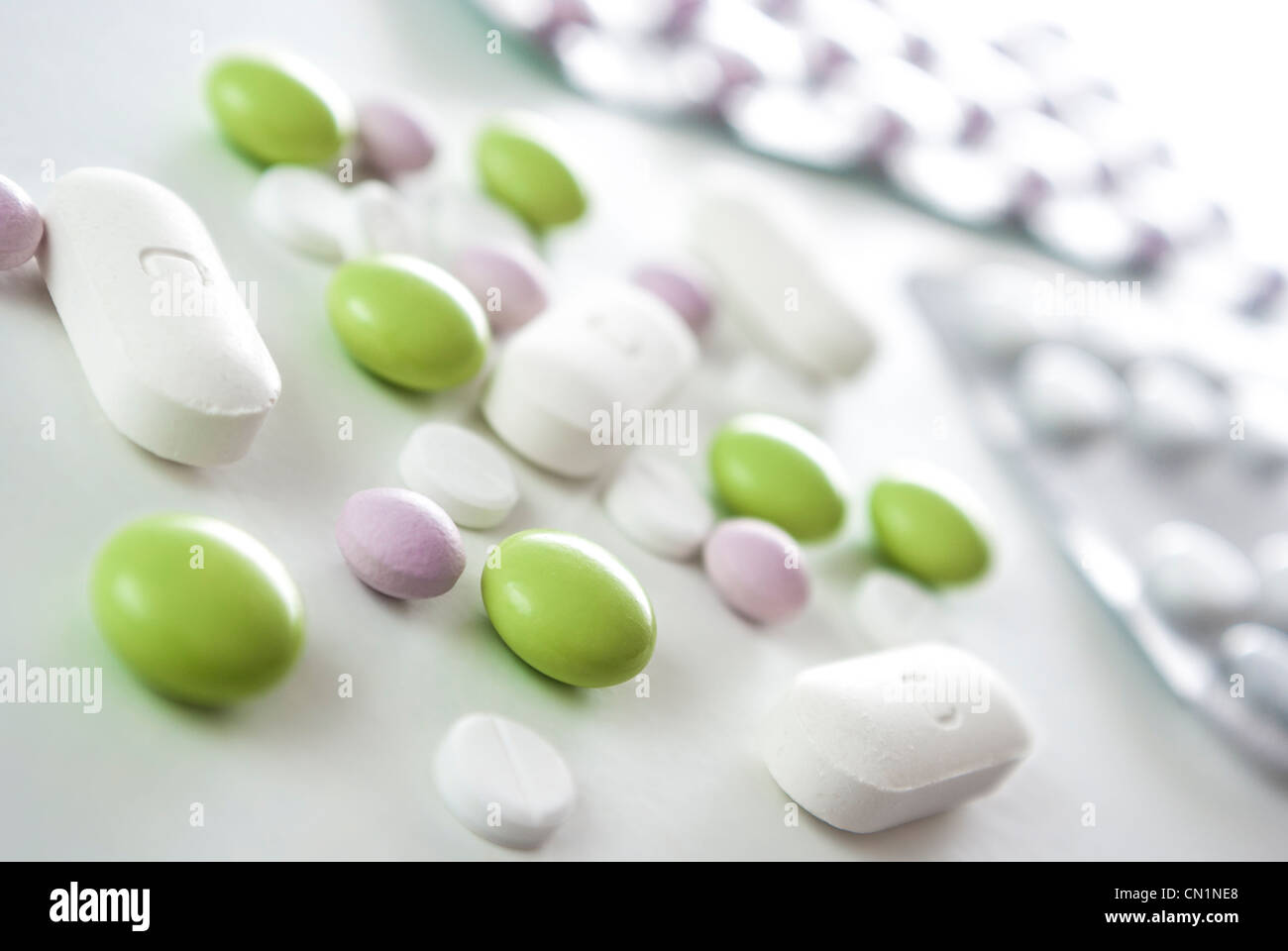 Assorted medical pills on a white background Stock Photo - Alamy